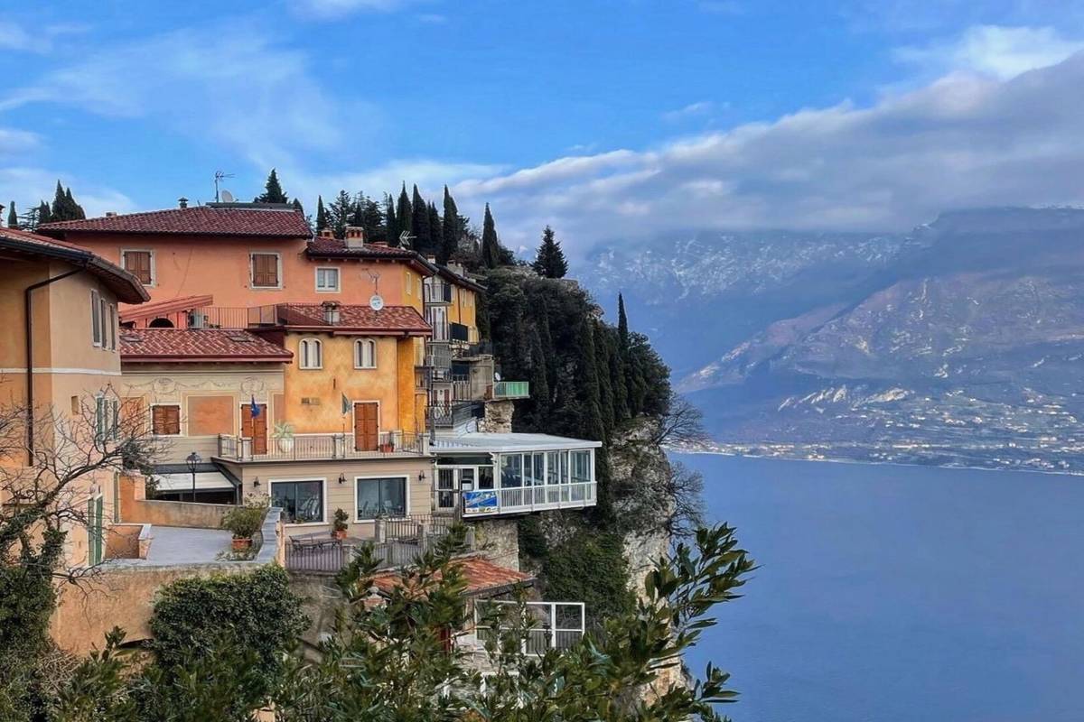 The enchanted village perched on a cliff overlooking the lake 2 1/2 ...