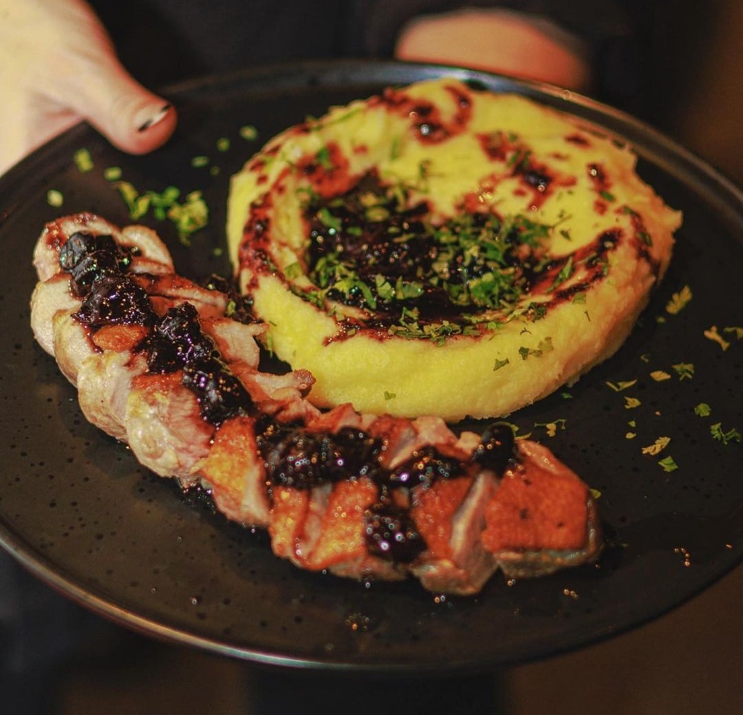 Adelaide's French Bistro, Le Pas Sage Serving Croissant Burgers