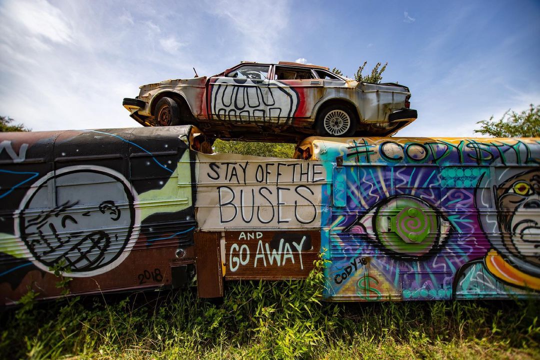This School Bus Graveyard In Alto Is Now An Art Lover's Paradise