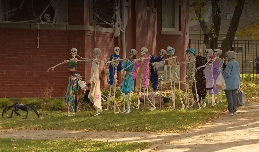 Skeleton Conga Line Taking Neighborhood By Storm