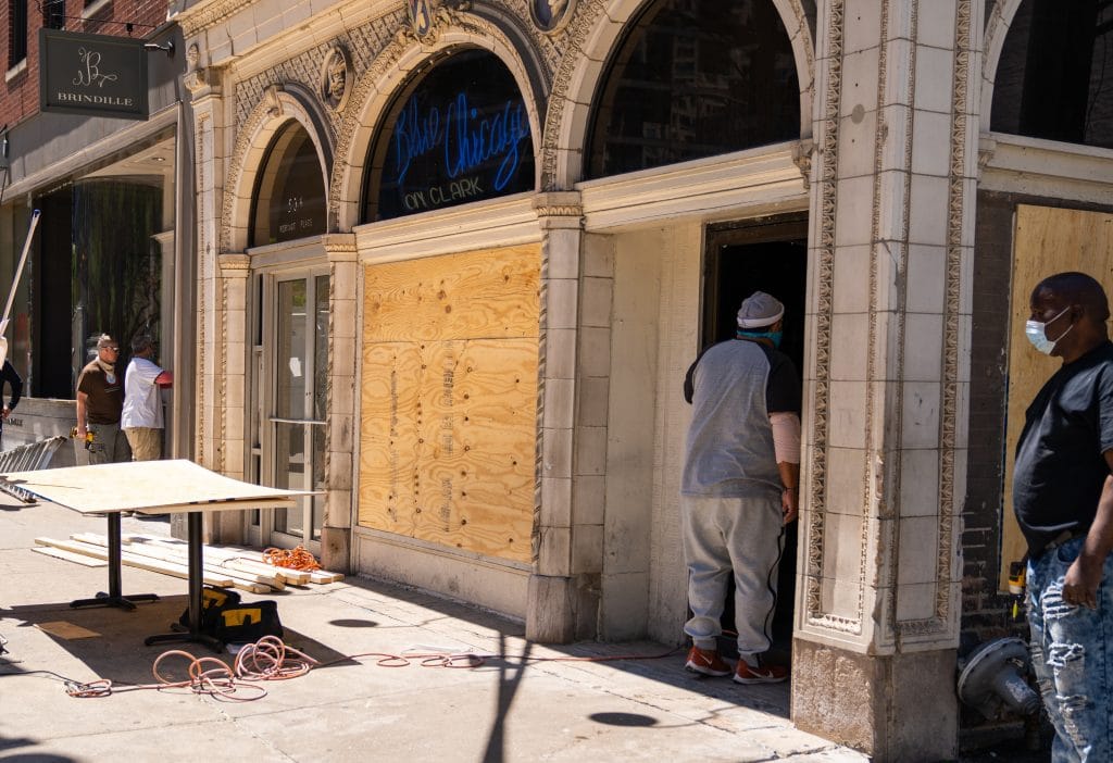 Caution Sweeps Chicago As Businesses Board Up Storefronts And The ...