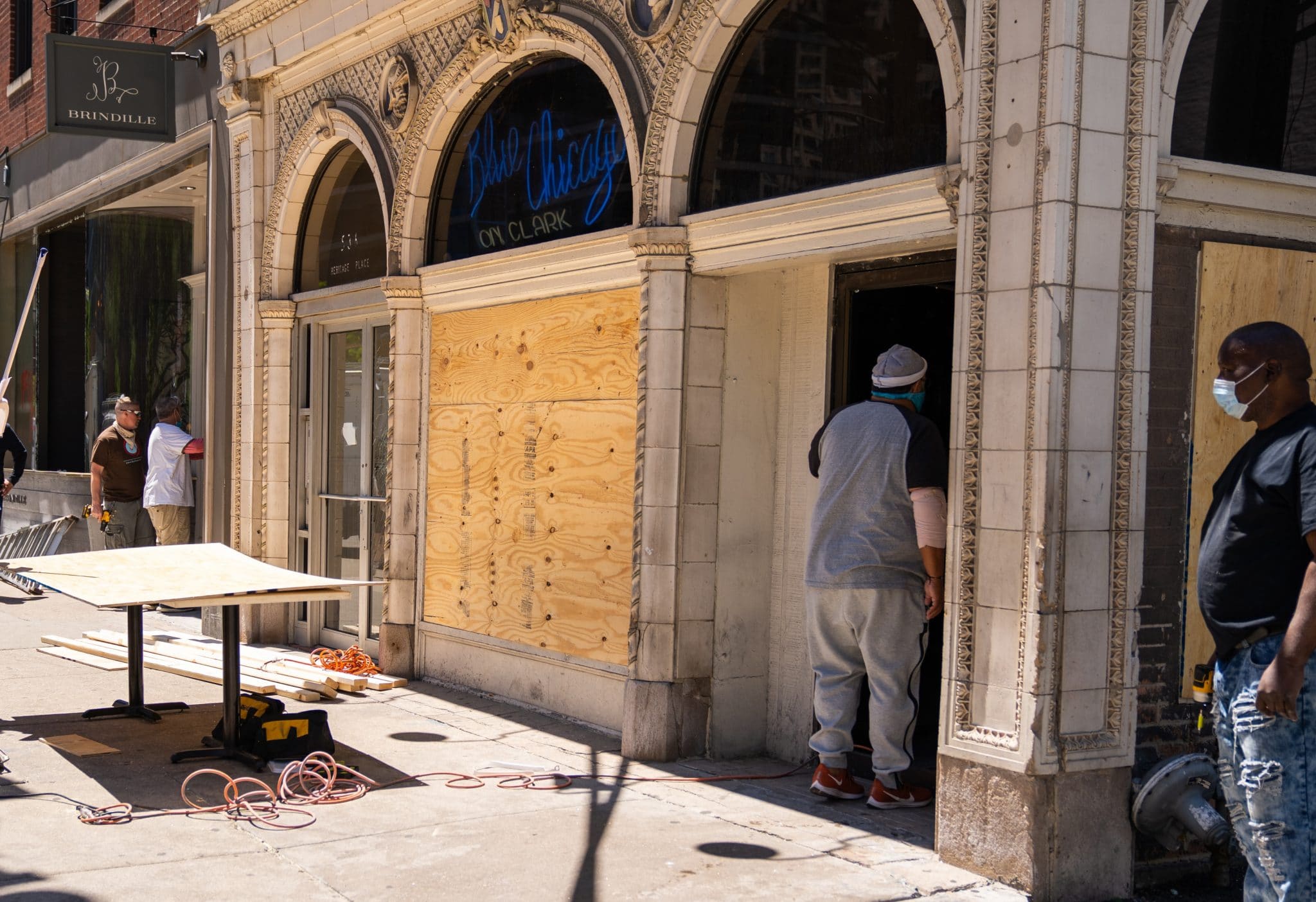 Caution Sweeps Chicago As Businesses Board Up Storefronts And The ...