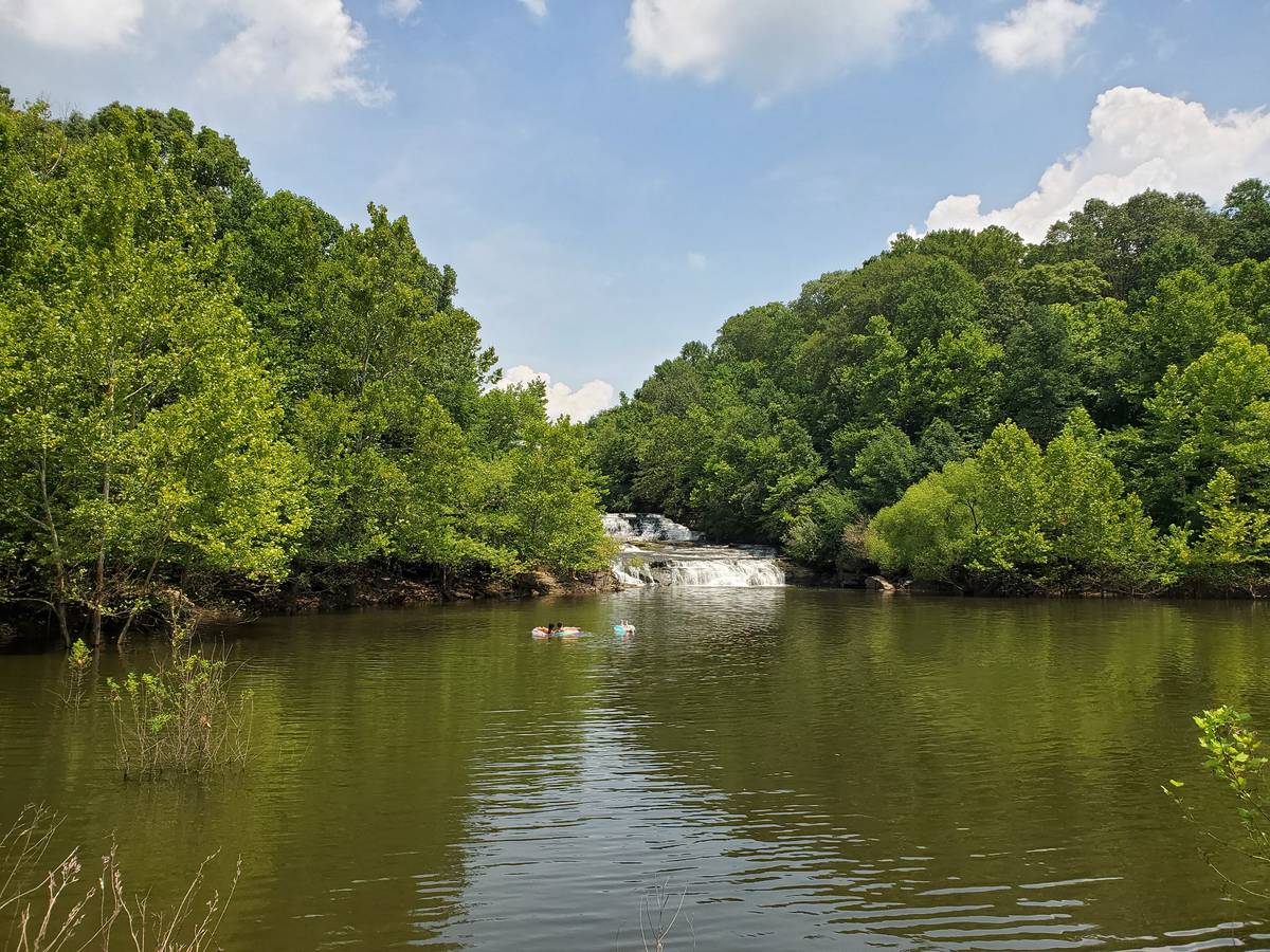 This hidden 3-level waterfall oasis in Illinois features a 15-foot deep ...