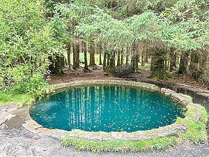 The Enigmatic Torwood Blue Pool With Bright Blue Waters Near Glasgow