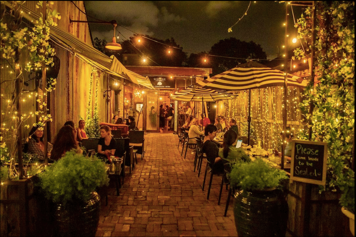 This Twinkly Euro-Inspired Courtyard And Wine Garden Is A True Hidden Gem