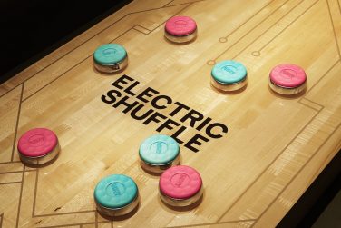 Electric Shuffle: The Lively Pair Of Hi-Tech Shuffleboard Bars In London