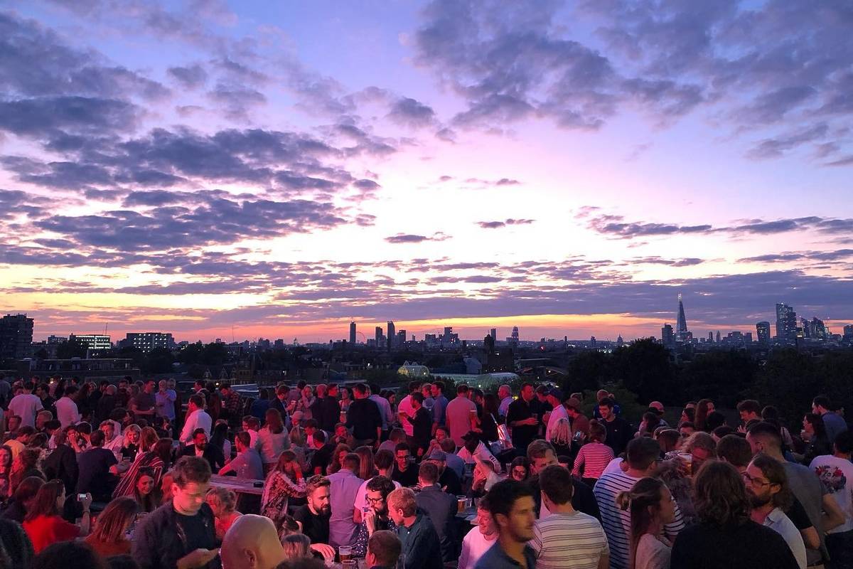 Frank's Cafe Is A Rooftop Bar With Vibes, Views, & Negronis