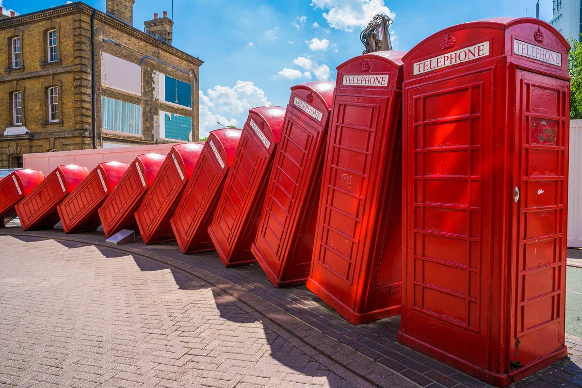 This Is The Story Behind London's Tumbling Telephone Boxes