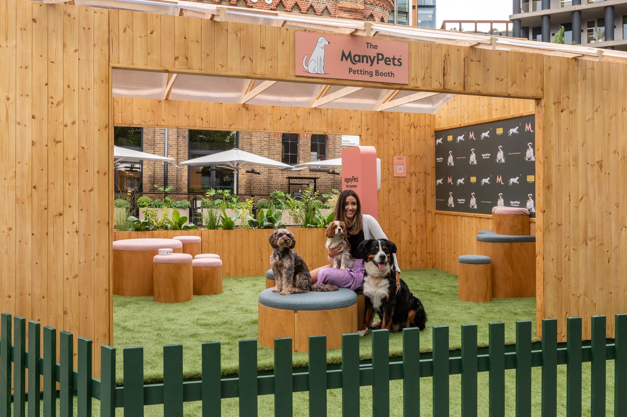 A Pop-Up Dog Petting Booth Is Set Up At King's Cross Today