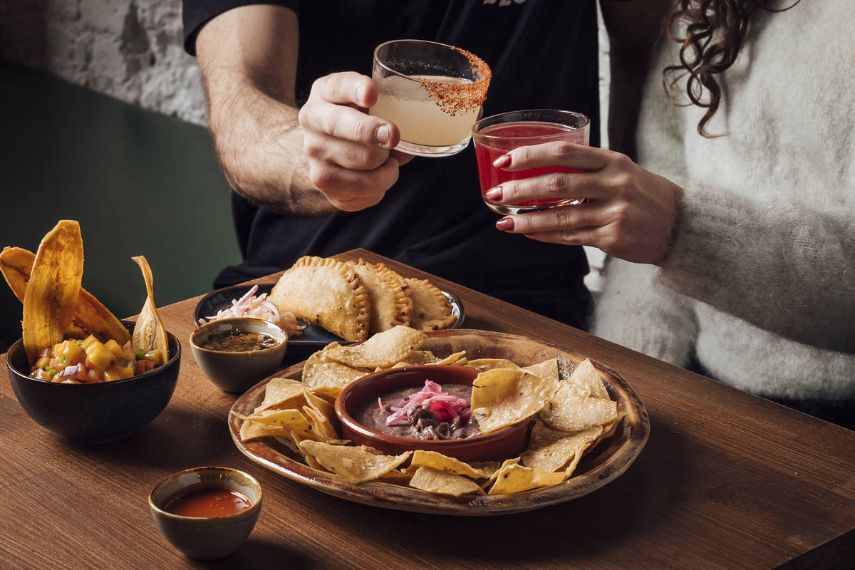 This Spot Hides A Hot Pink Mezcal Bar And Latin-American Food