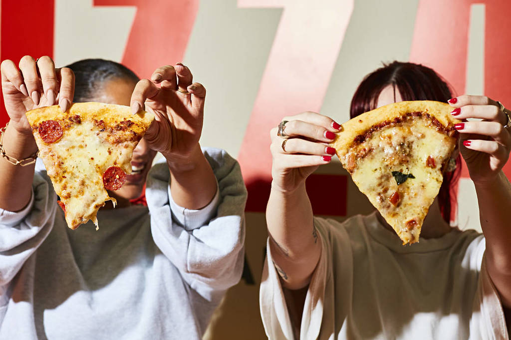 This London Pizzeria Serves Up Bottomless Pizza And Pitchers