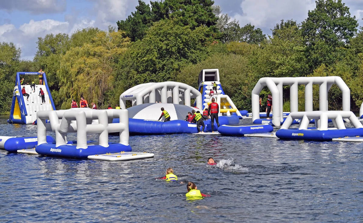 This Thrilling Water Park Has A Giant Floating Obstacle Course On A ...