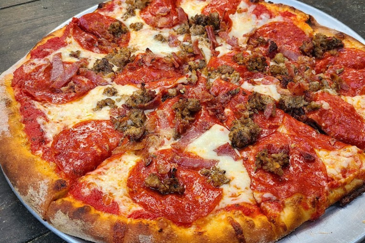 This Hidden Rustic Cabin Serves Some Of The Best Fire Roasted Pizza