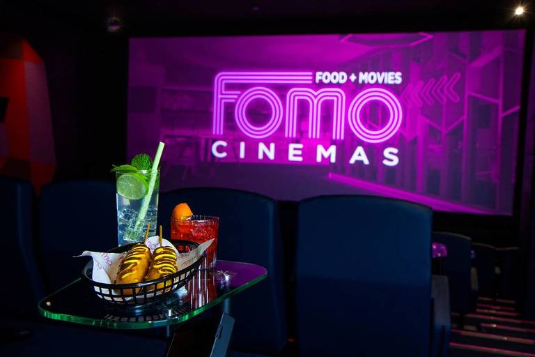 FoMo Cinemas Is Bringing Dinner And A Movie In One Easy Place