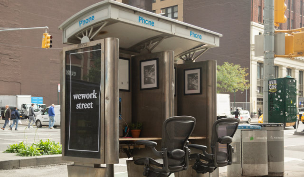 Pranksters Brought A "WeWork" To NYC Telephone Booths And It Was Hysterical