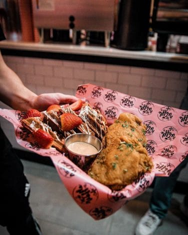 This Colorful New Café Devoted To Waffles Is Only A Short Train Ride ...