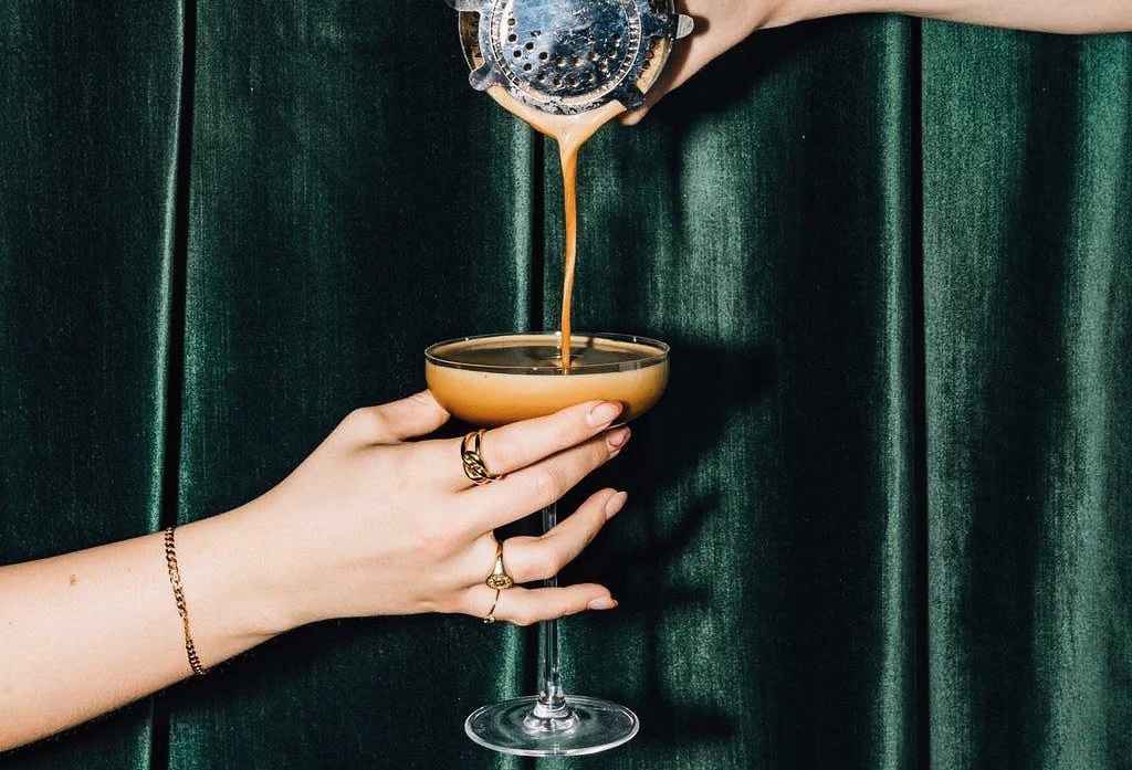 This Coworking Space Has A Snazzy Secret, & It Involves $10 Martinis