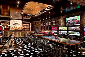 F1 Arcade Brings High-Speed Thrills & Cocktails To Philly