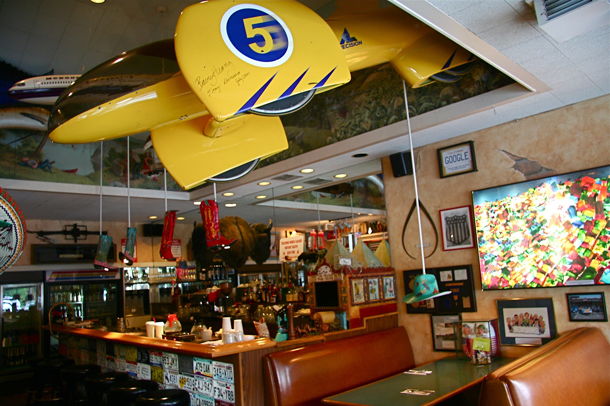 This Funky Restaurant Hosts An Epic Merger Of Odd Collectibles And Tech ...