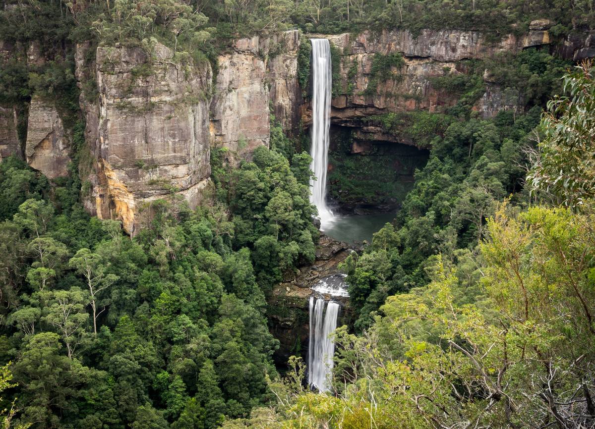 This Stunning Two-Tiered Waterfall Thunders Into A Lush Valley, And It ...